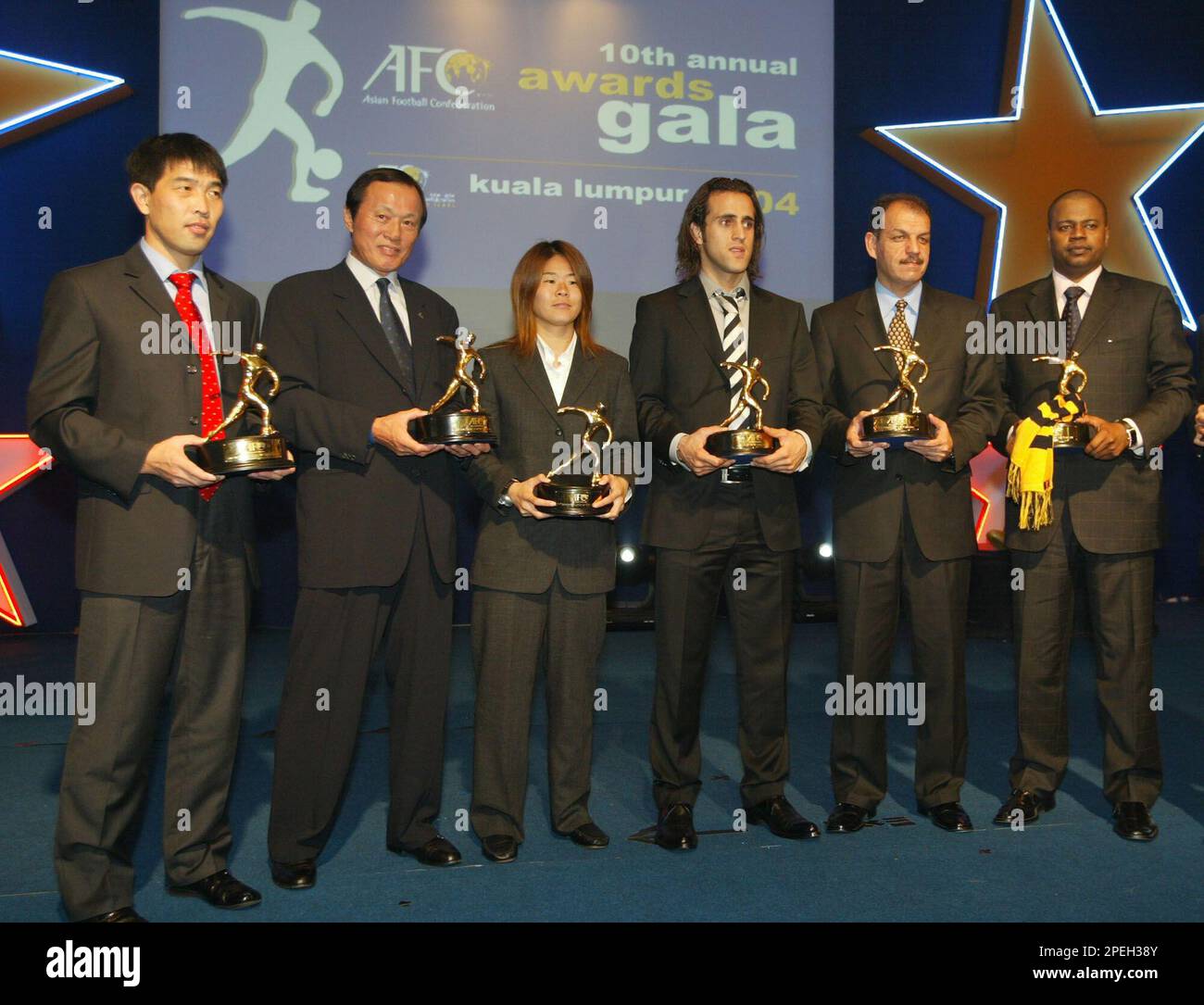 Winners of the Asian Football Confederation (AFC) awards, Match Official of the Year Lu Jun of ...