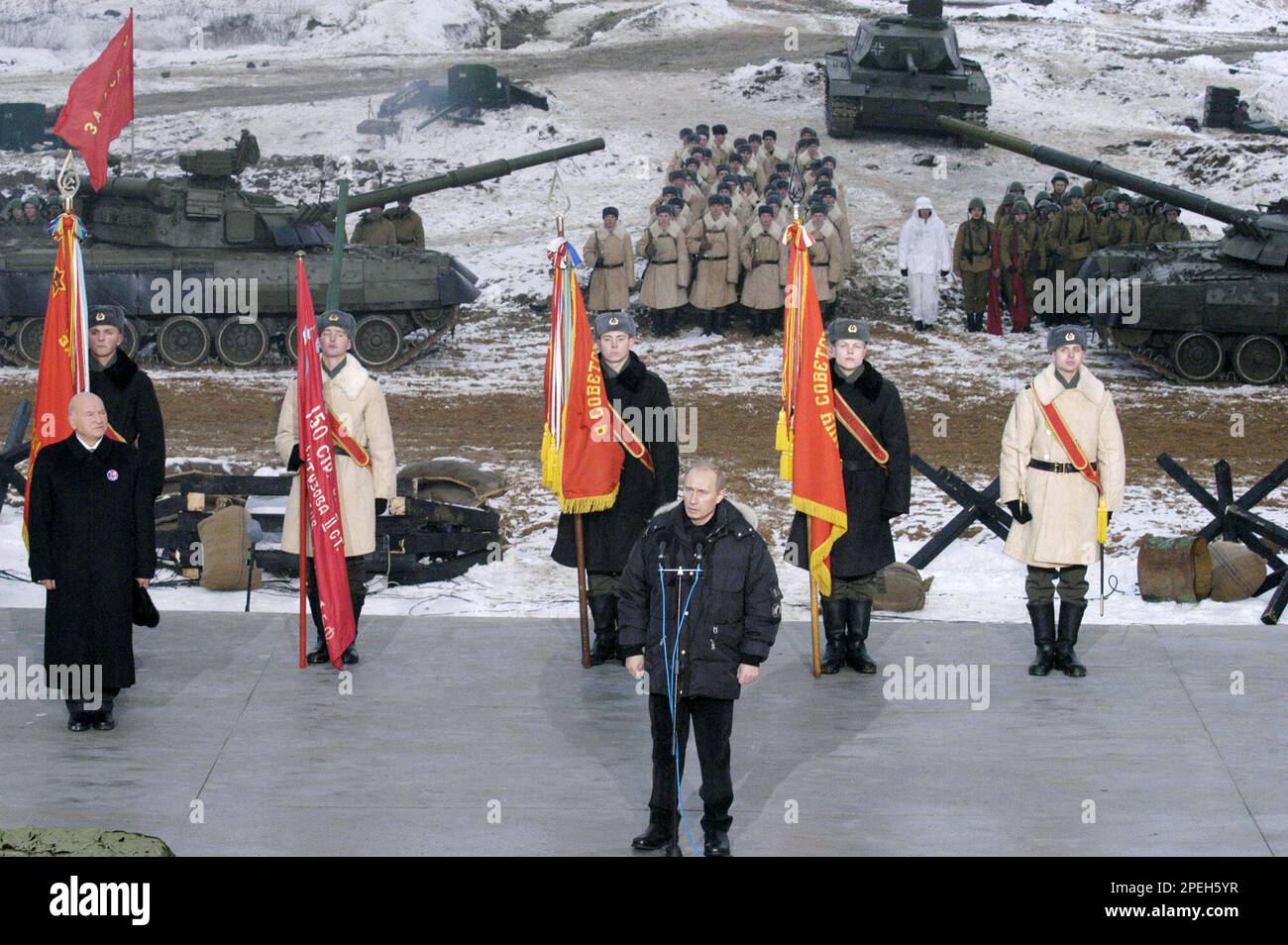 President Vladimir Putin, front centre, speaks at the re-enactment of ...