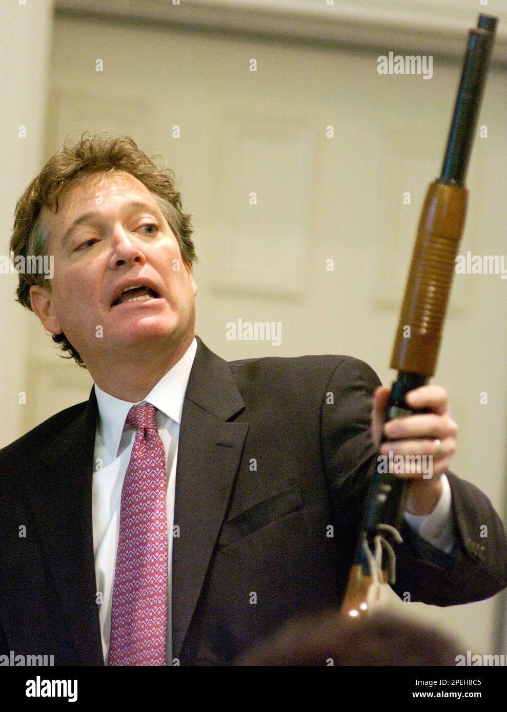 Suffolk County Assistant District Attorney Josh Wall, displays a ...