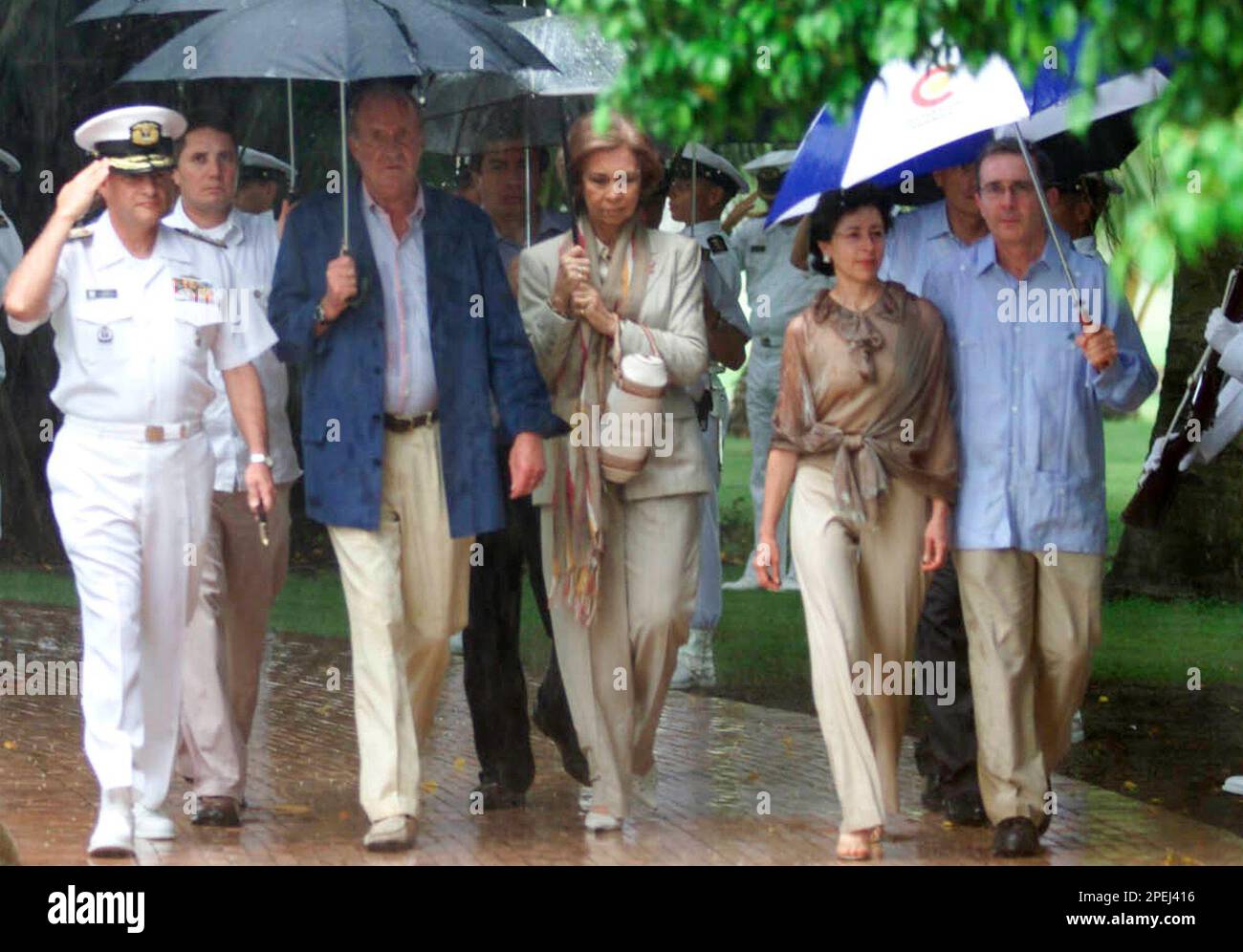 King Juan Carlos of Spain, second from left, accompanied by Queen Sofia ...