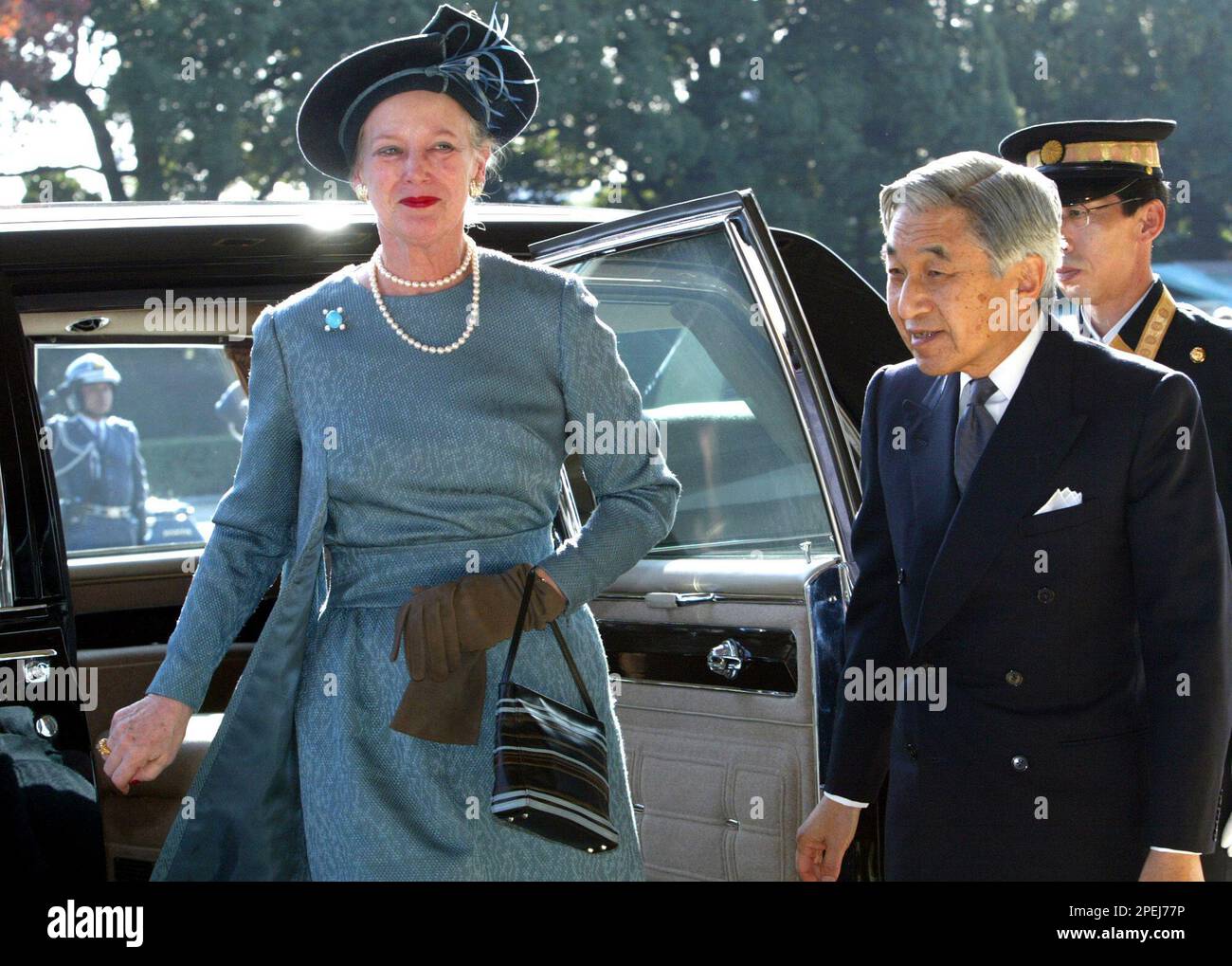 Accompanied by Japanese Emperor Akihito, right, Danish Queen Margrethe ...