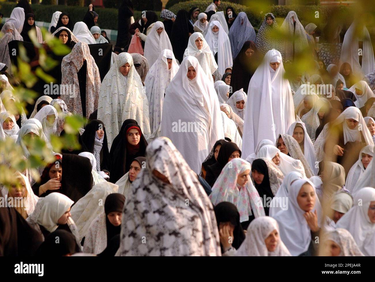 Iranian Muslim women attend morning Eid prayers in Tehran Sunday, Nov ...