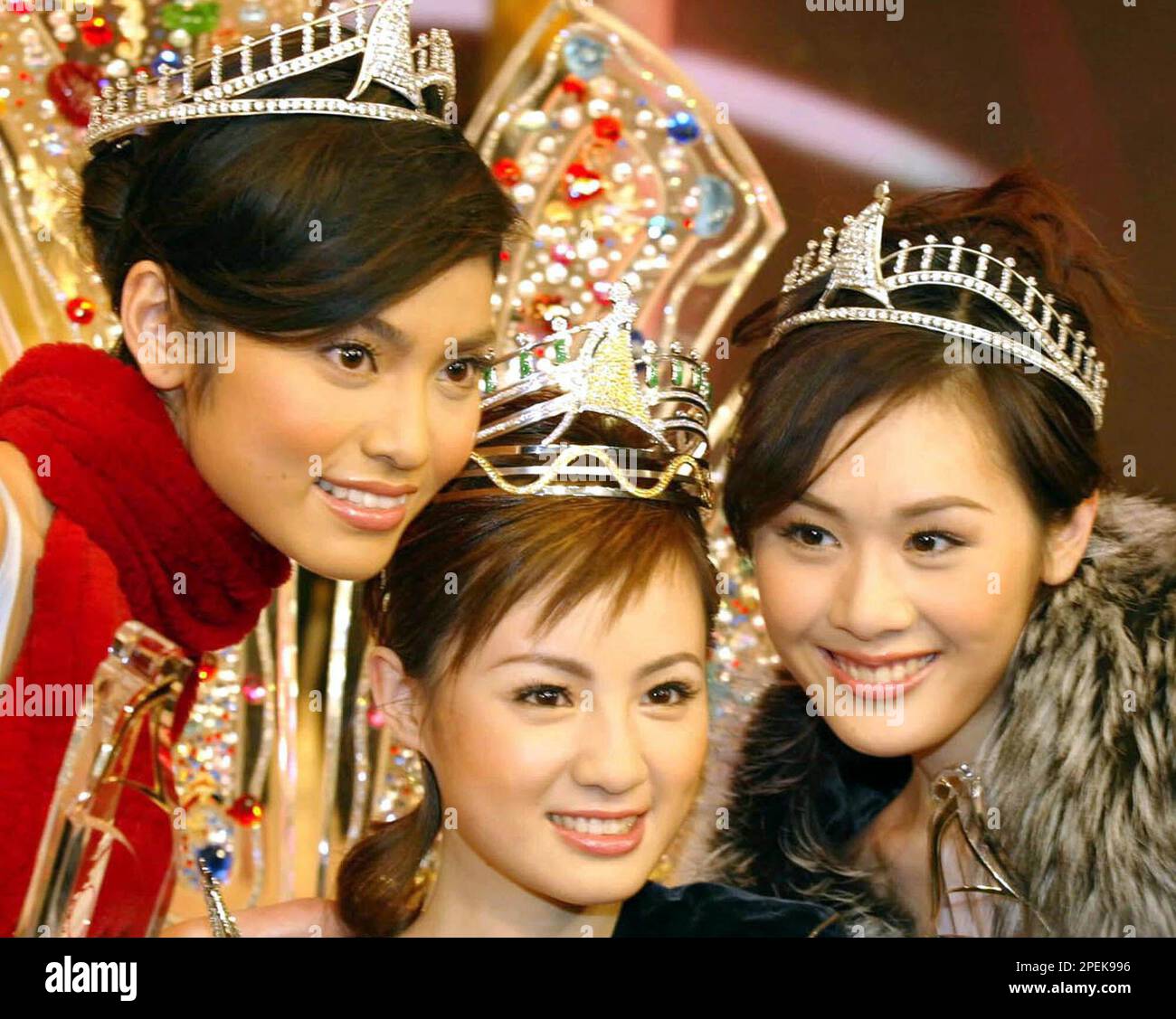 Lu Jingjing, Miss Asia 2004, center, is flanked by first runner-up ...