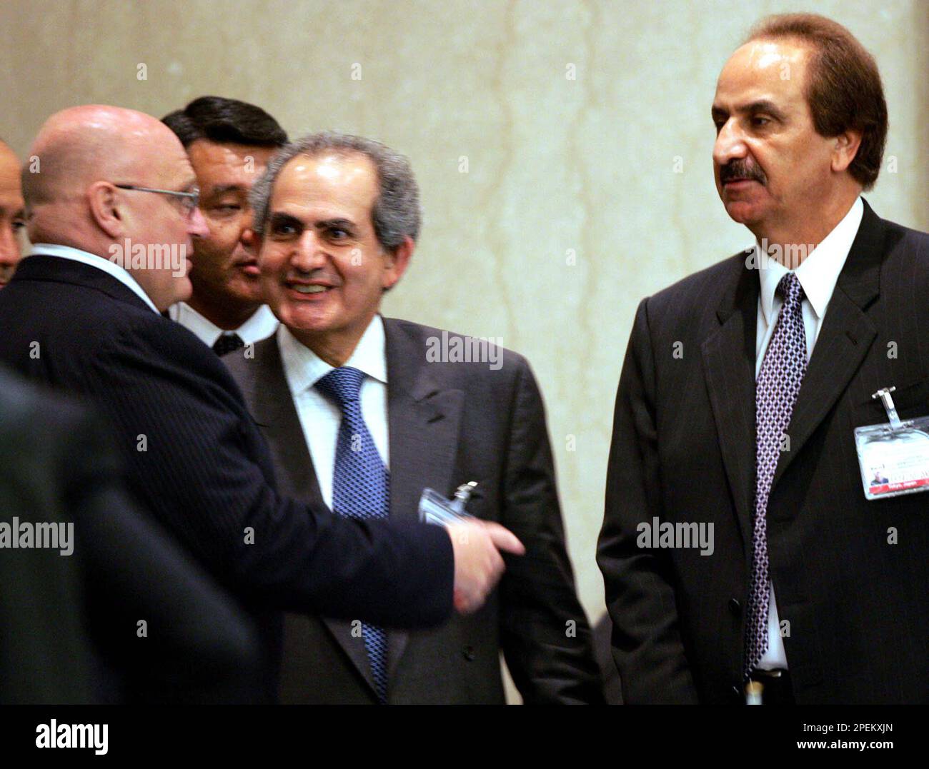 U.S. Deputy Secretary of State Richard Armitage, left, chats with Iraqi ...