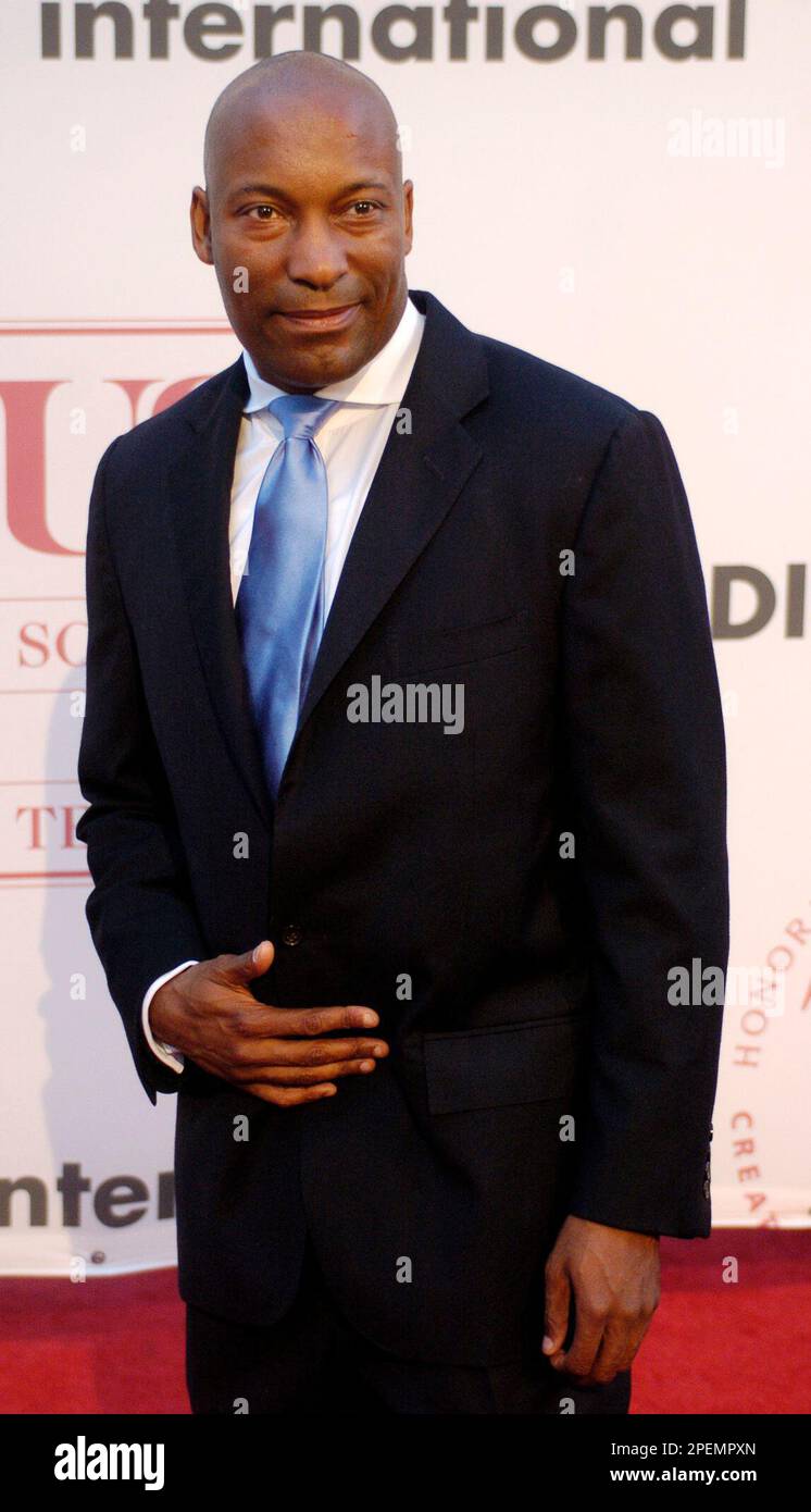 Film director and USC alumnus John Singleton arrives for the 75th ...