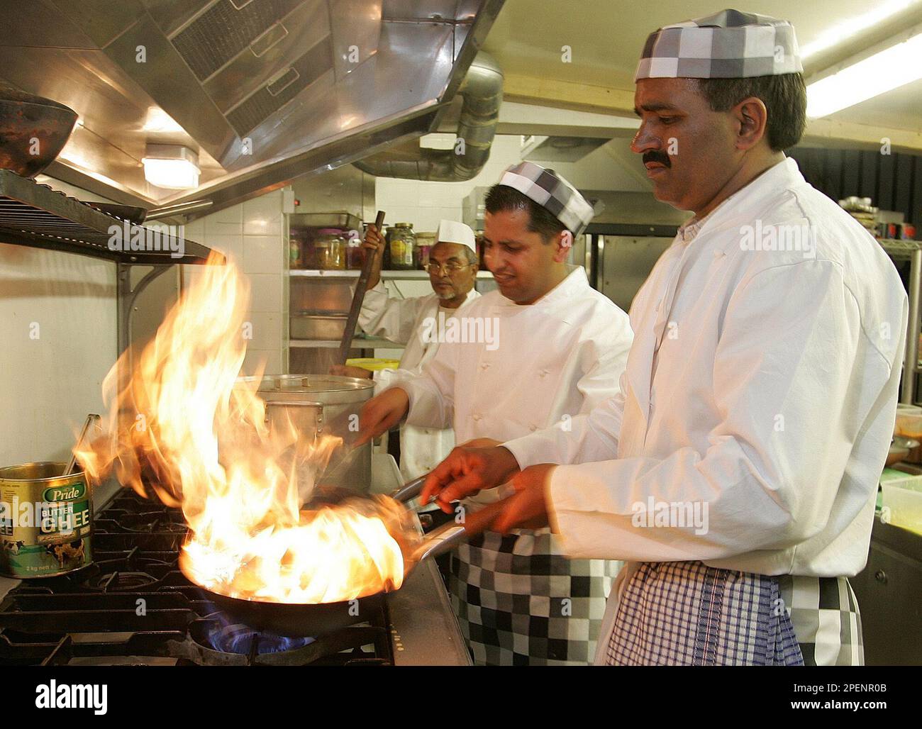 Winners of the best Bangladesh curry competition Tariq Mahmood, right ...