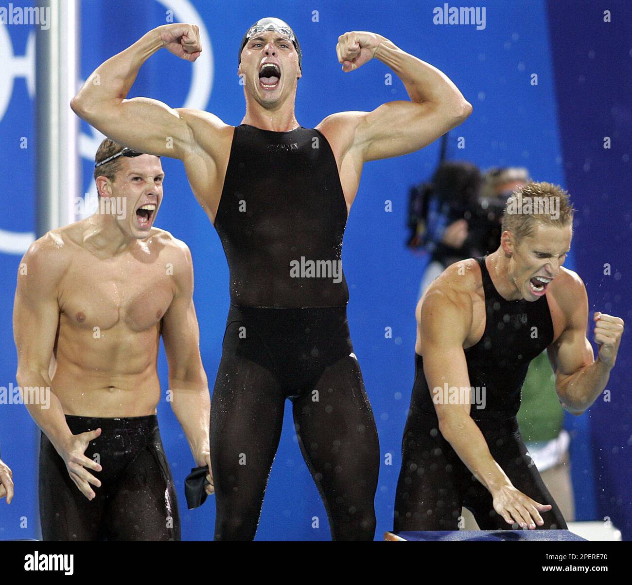 South African swimmers react after winning the 4x100m freestyle relay ...