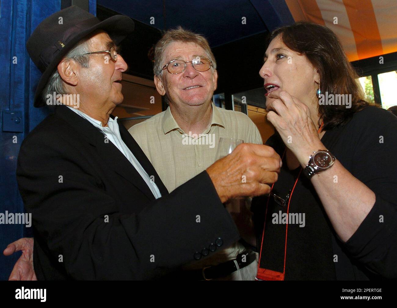 Festival Director Irene Bignardi, right, speaks to Swiss photographer ...