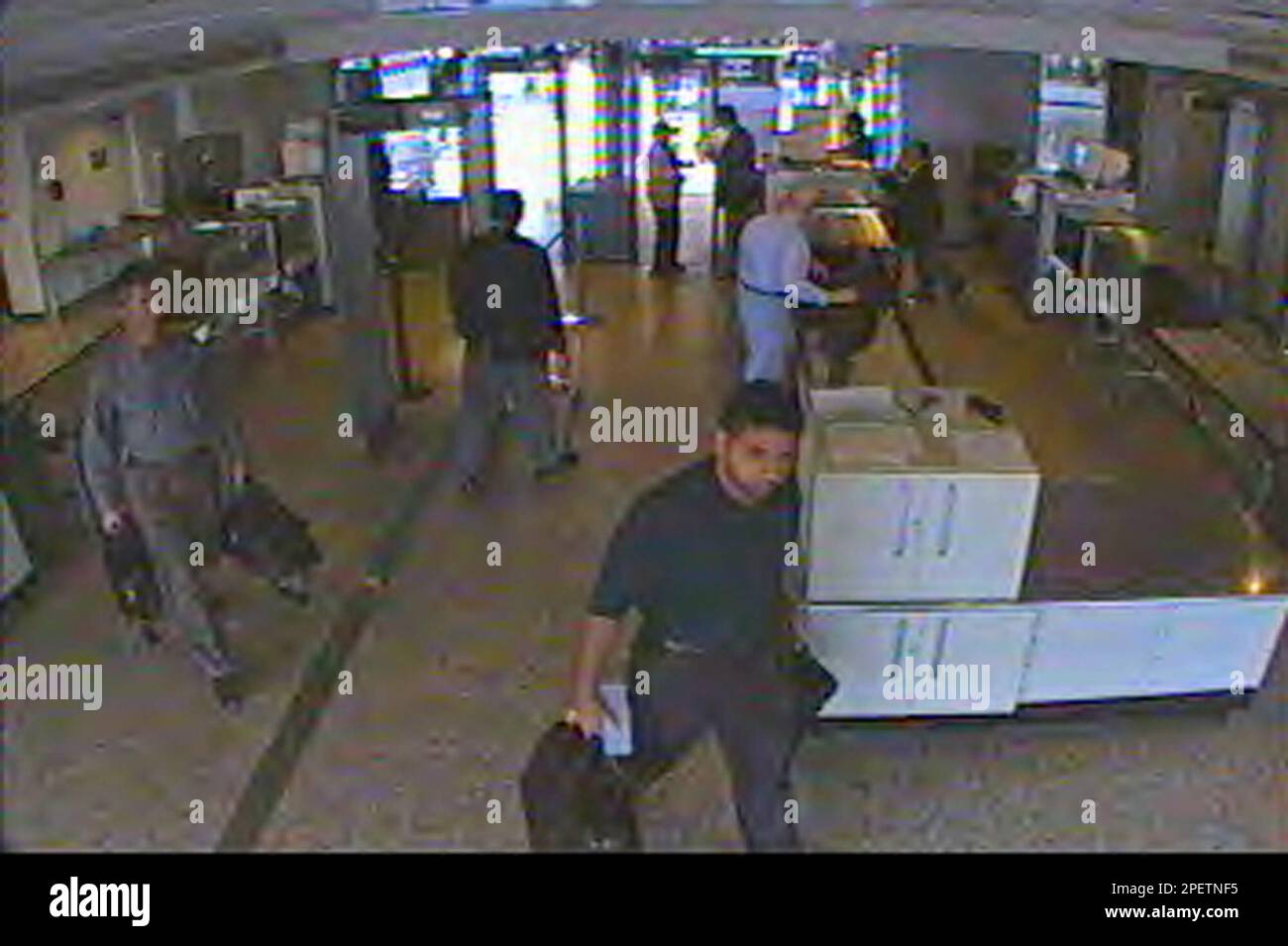 Hijacker Hani Hanjour, center foreground, believed to have piloted ...