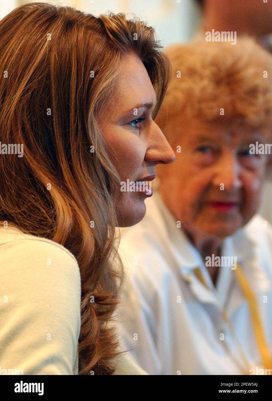 Steffi Graf, left, of Germany faces reporters at the Tennis Hall of ...