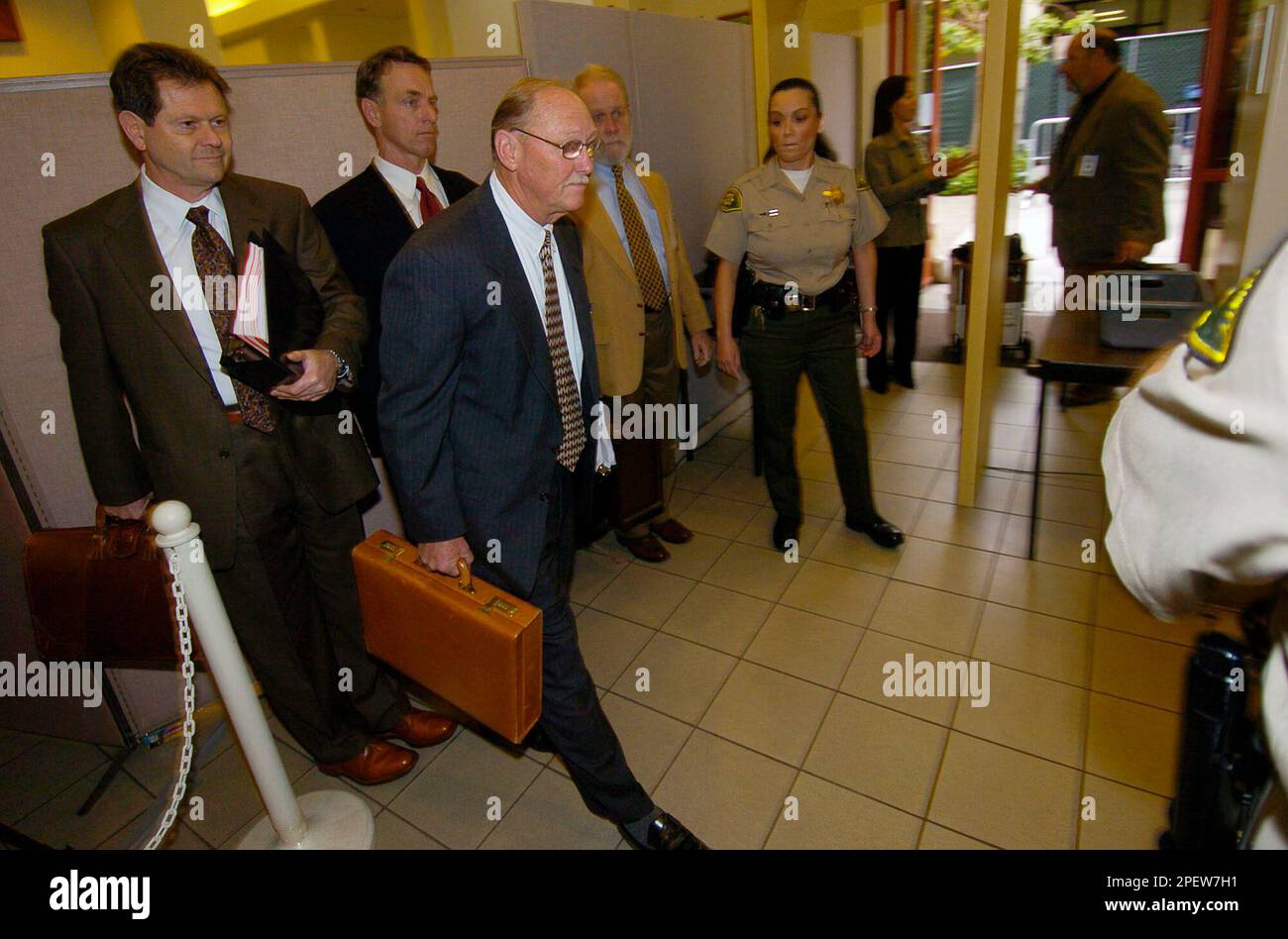 Santa Barbara County District Attorney Thomas Sneddon, third from left ...