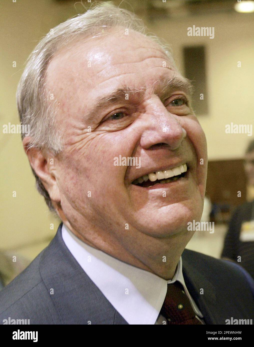 Liberal Leader Paul Martin smiles as he arrives at a polling station on ...