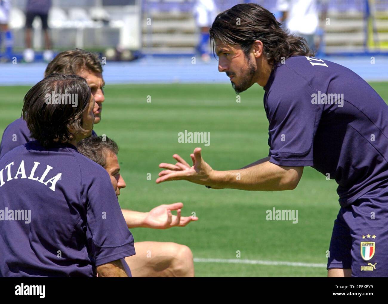 Italy's national soccer players Gennaro Gattuso, right, speaks to his ...