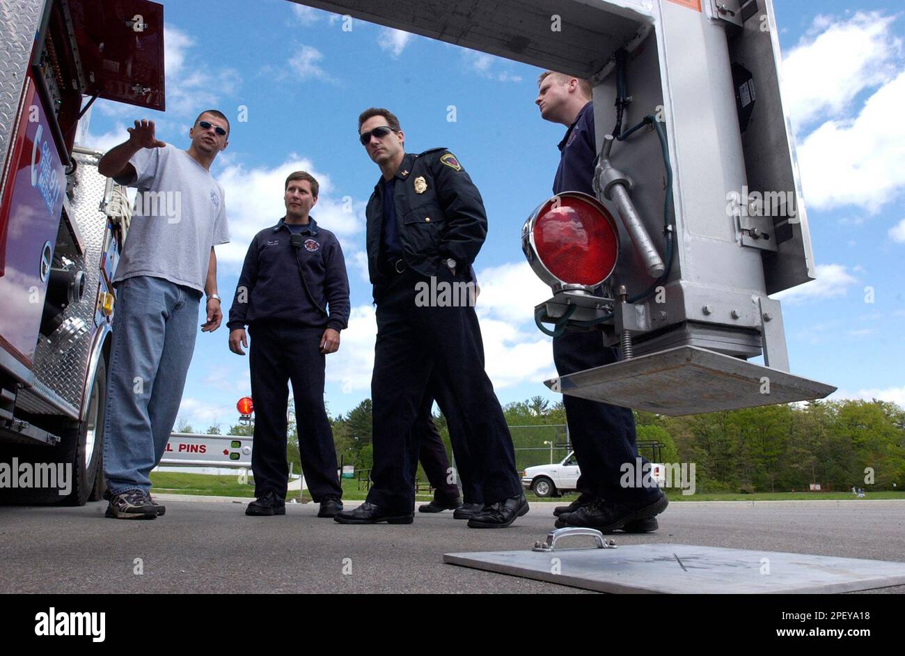 Jimmy Plasters of KME Fire Apparatus, left, discusses the fetures of ...
