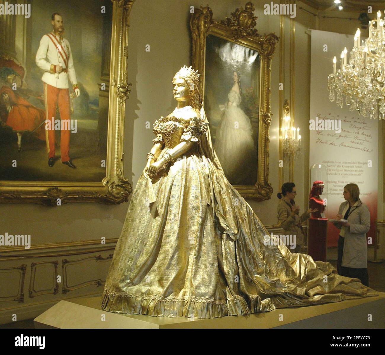 Visitors look at one of the Sisi figures displayed at the new Sisi ...