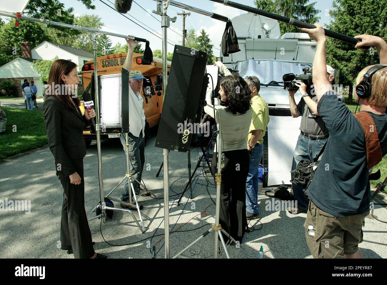 Reporter Muna Shikaki of Al-Arabiya television and her crew works ...