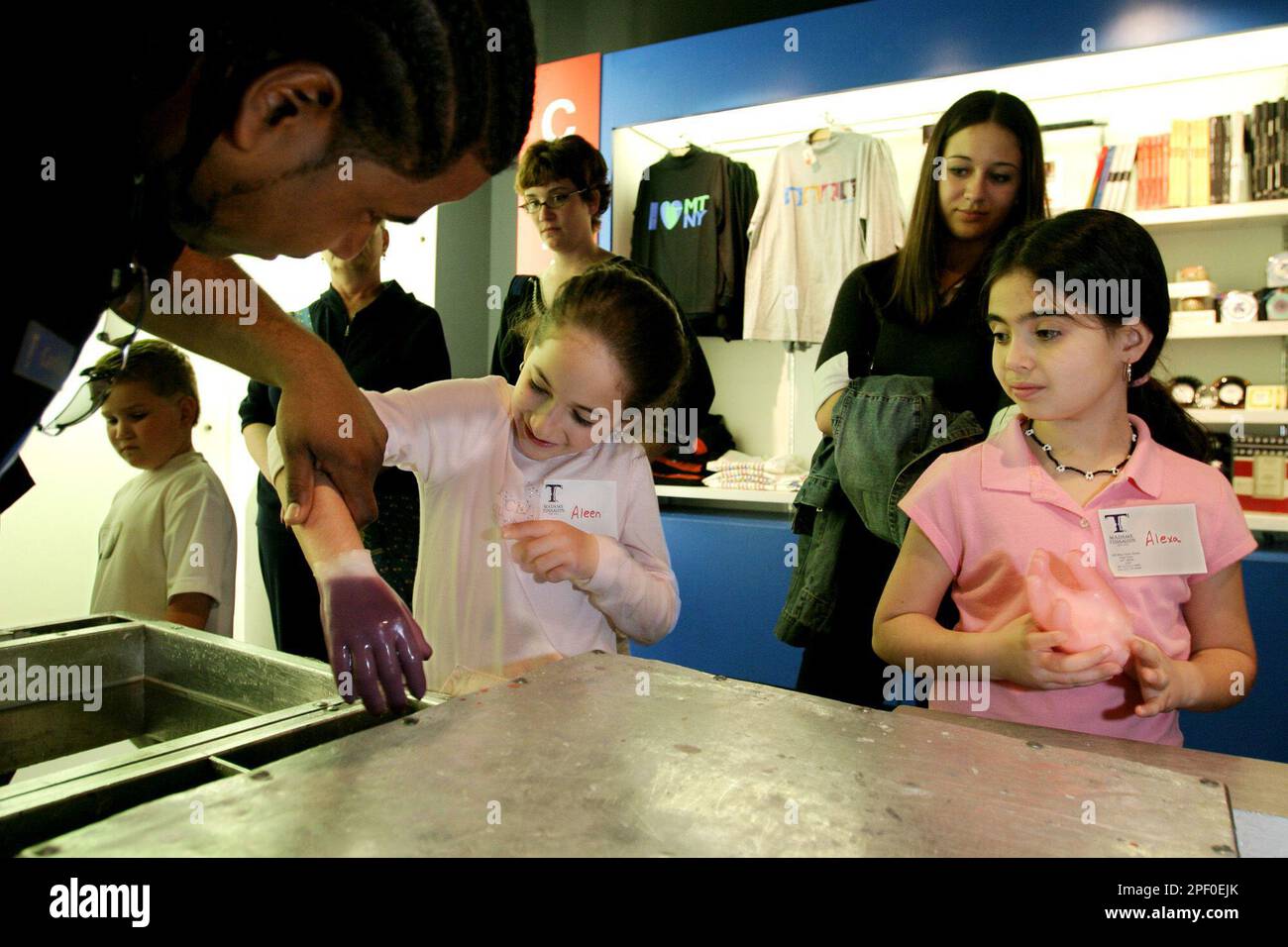 Aleen Voskevijian, second left, and Alexa Giorgetti, right, who both ...