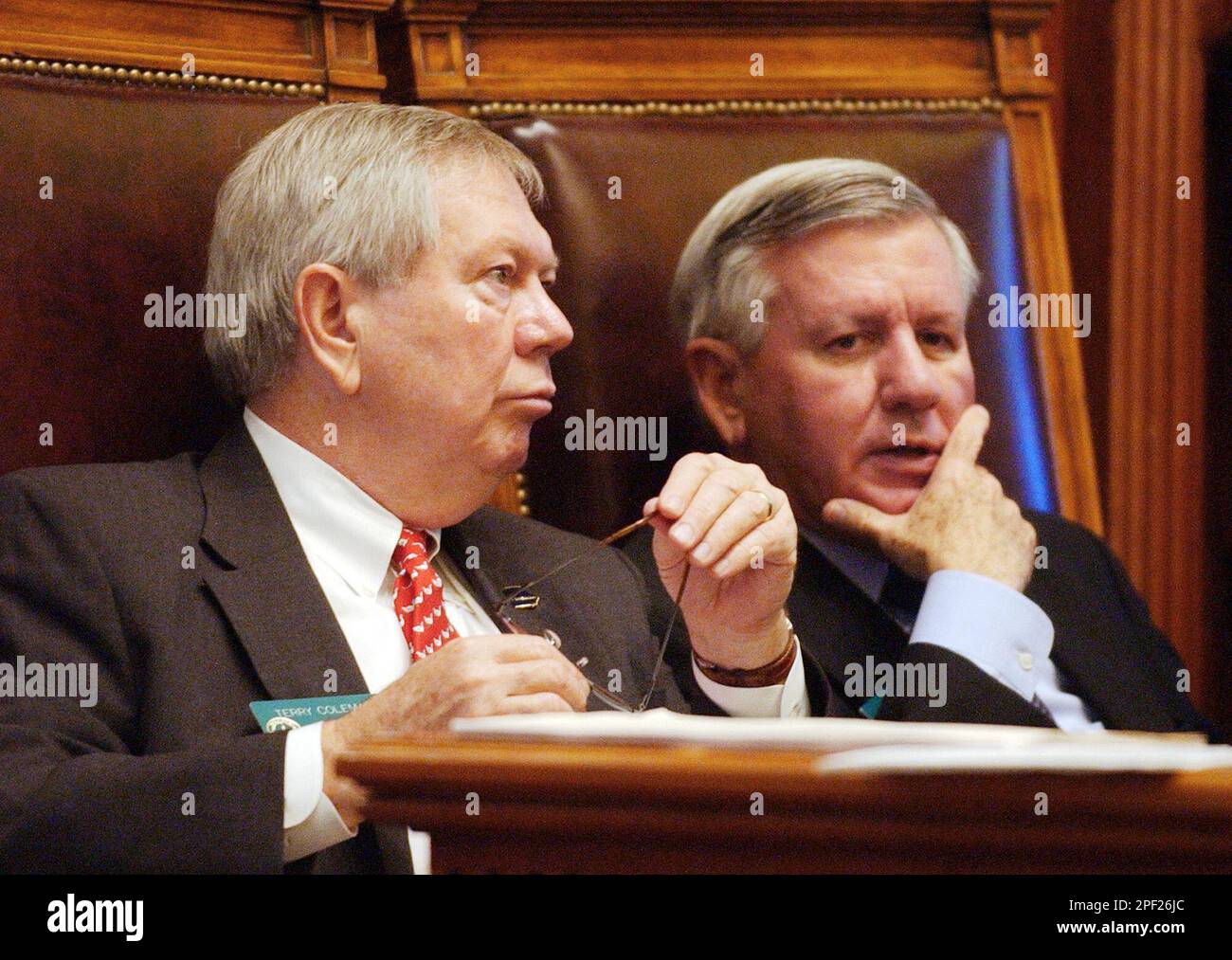 Speaker of the House Terry Coleman, D-Eastman, left, talks with Rep. Larry Walker, D-Perry, as ...
