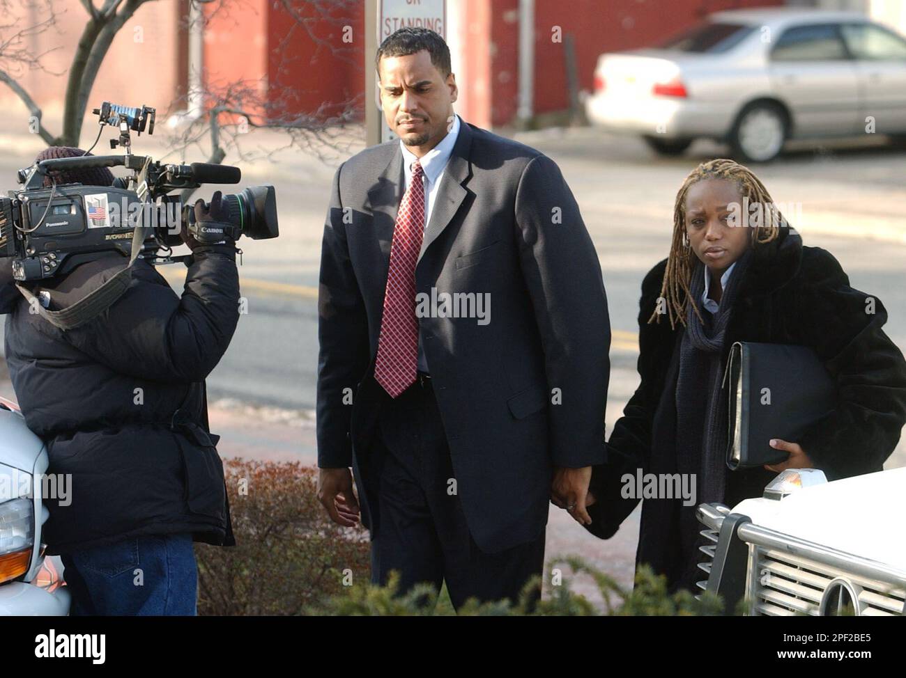 Former New Jersey Nets star Jayson Williams, center, arrives with his ...