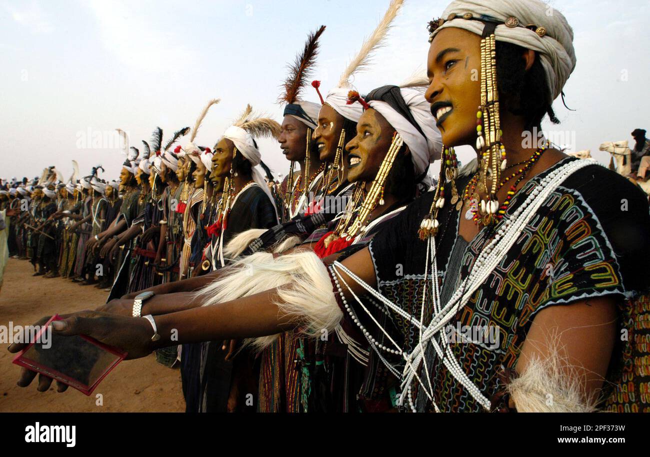**TO GO WITH STORY TITLED NIGER MR SAHARA** A Wodabe man carrying a ...