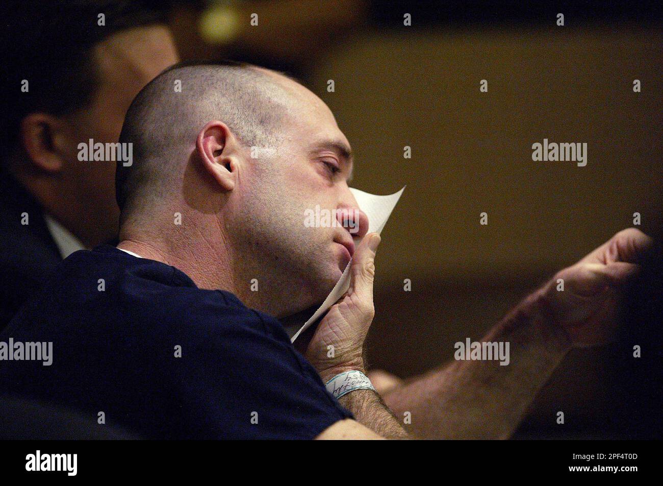 Timothy Koile wipes his face as he is given the maximum sentence of 10 ...