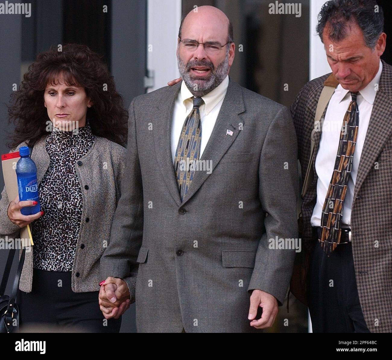 Clinton Odell Weidner II, former president of Capital City Bank, center ...