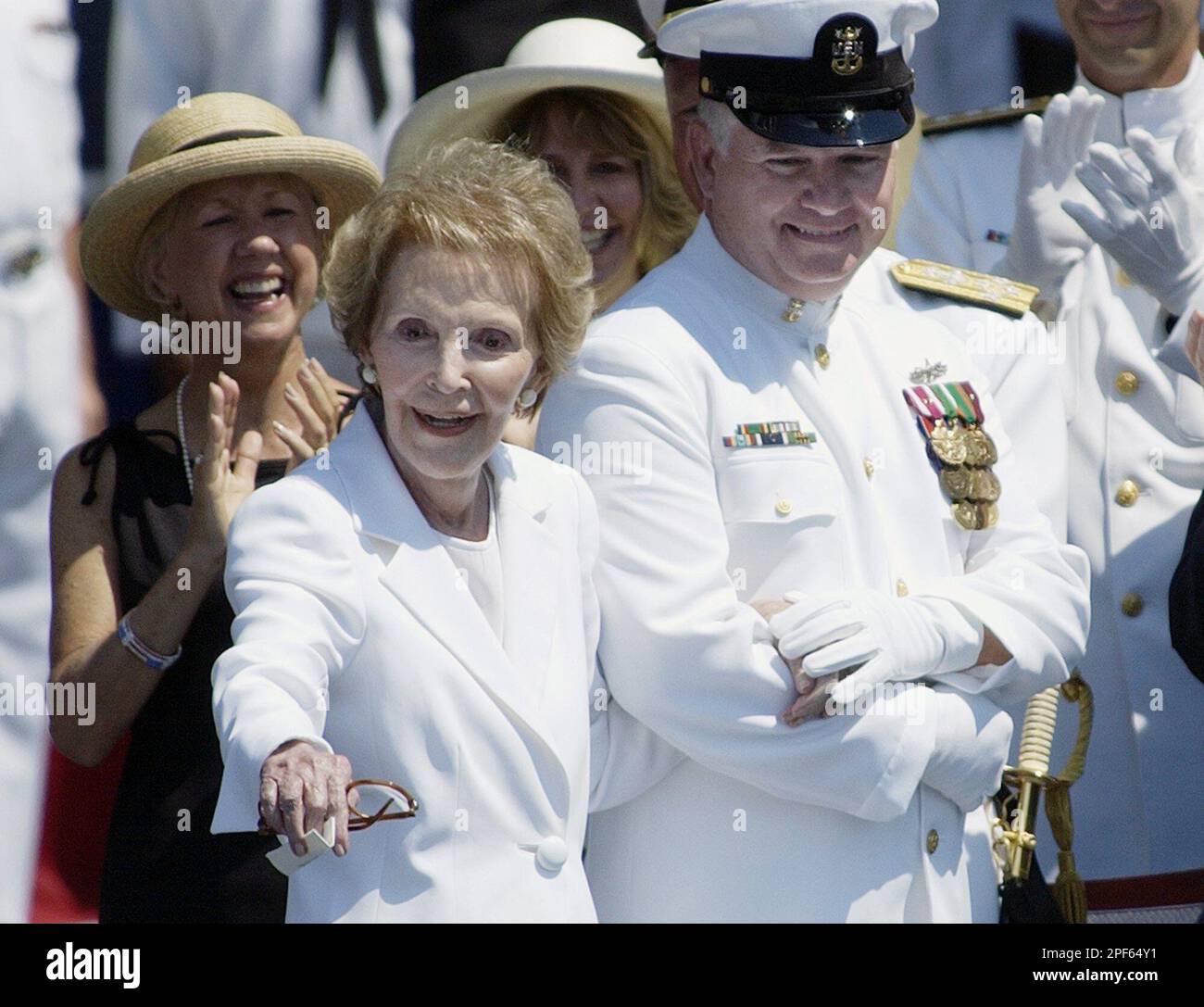 Former first lady Nancy Reagan, left, is escorted by Command Master ...