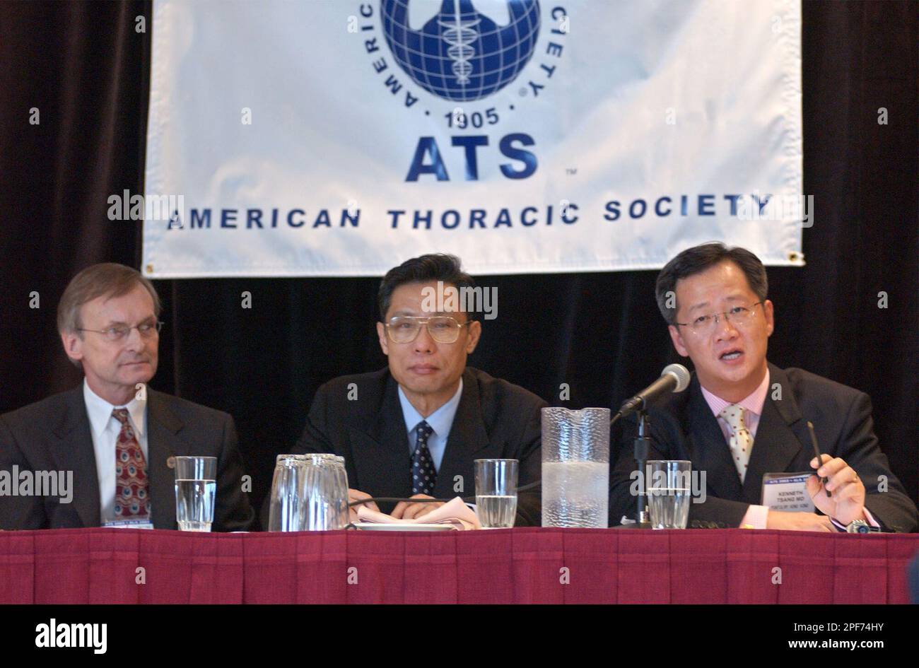 Kenneth Tsang, right, of Queen Mary Hospital, Hong Kong, talks during a ...