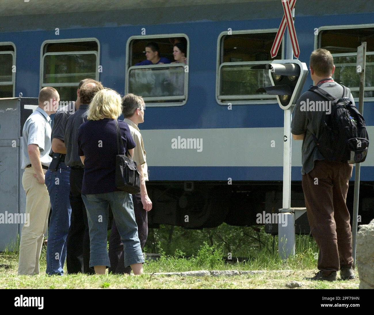 Relatives of the victims of collision between a tourist bus and a ...