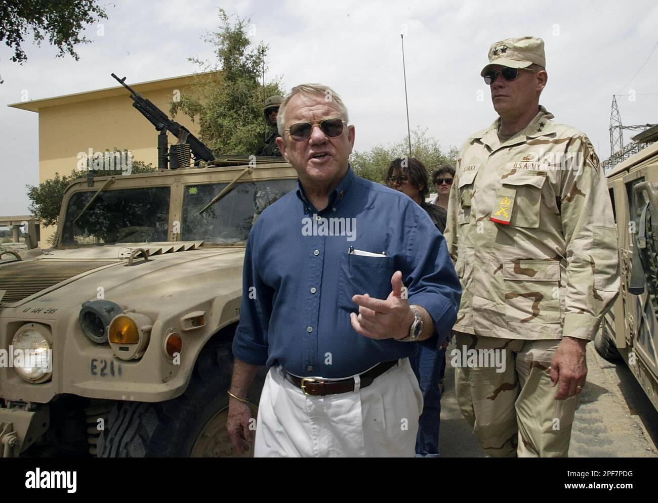Retired US general Jay Garner, left, who will run post-war Iraq, arrives to Baghdad's southern ...