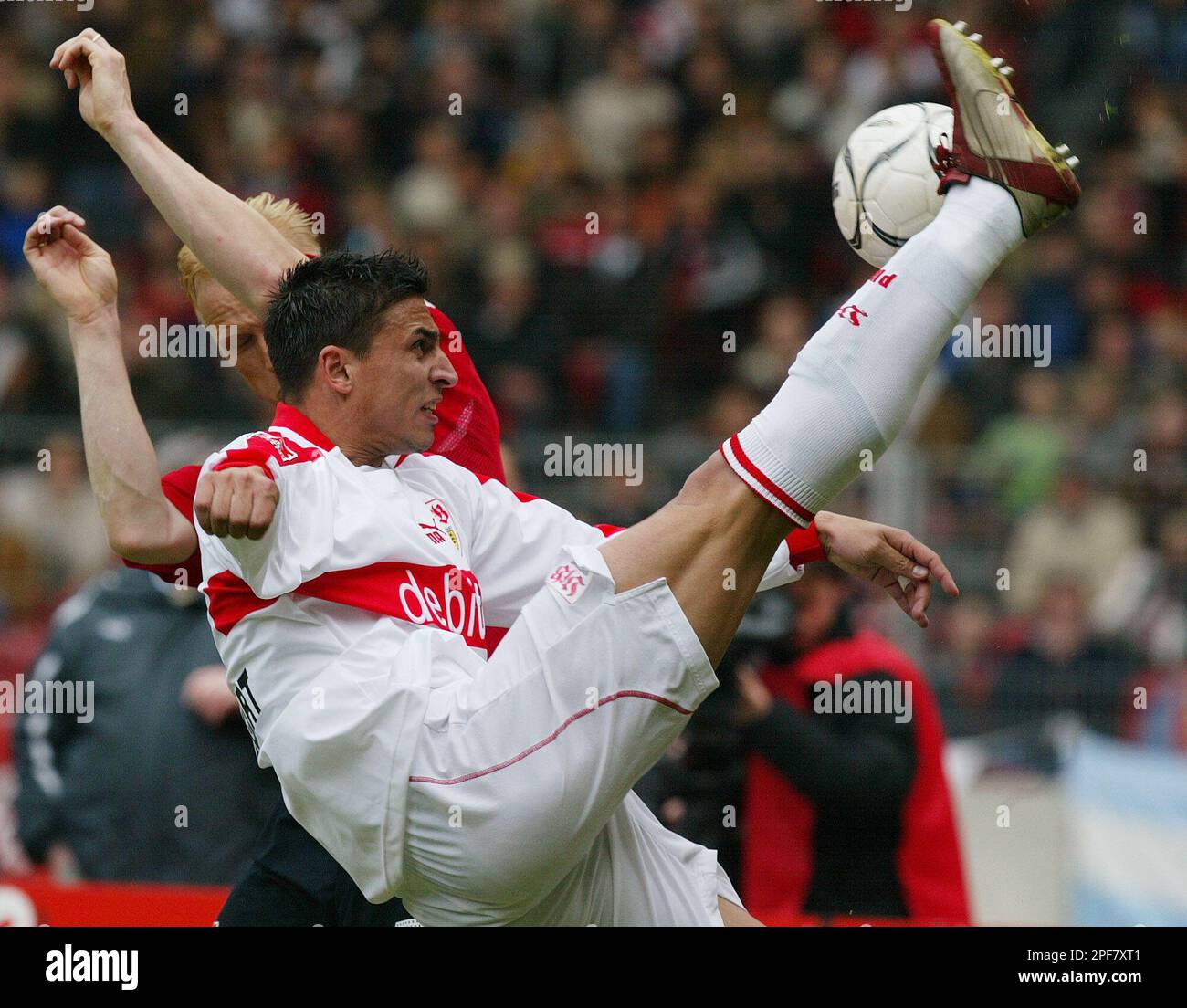 Portugal's Fernando Meira of VfB Stuttgart stretches for the ball ...