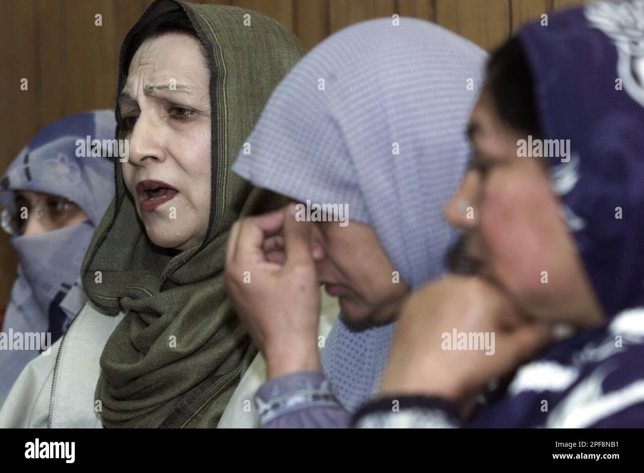 Zahida, second from left, neighbour of Ahmed Abdul Qadus who was ...