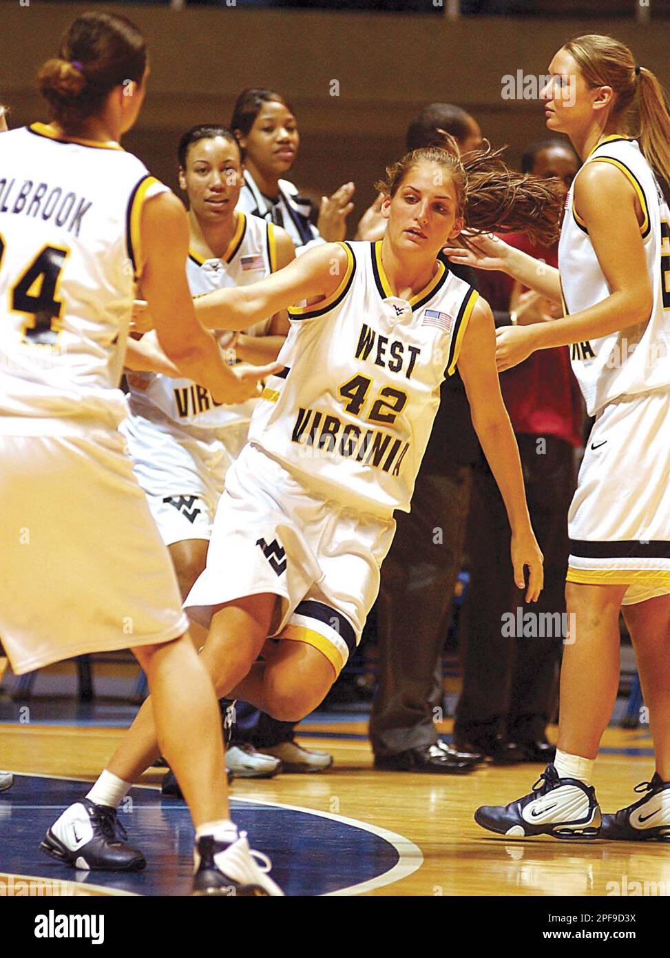 West Virginia's Kate Bulger (42) takes the floor after being introduced ...