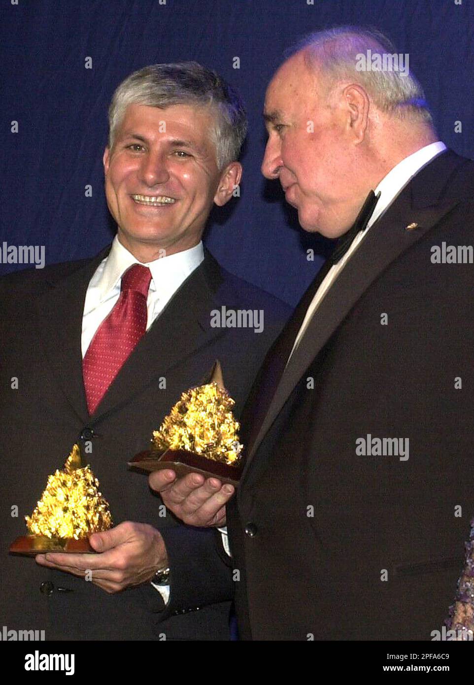 Zoran Djindjic, left, Prime Minister of Serbia, talks to former German ...