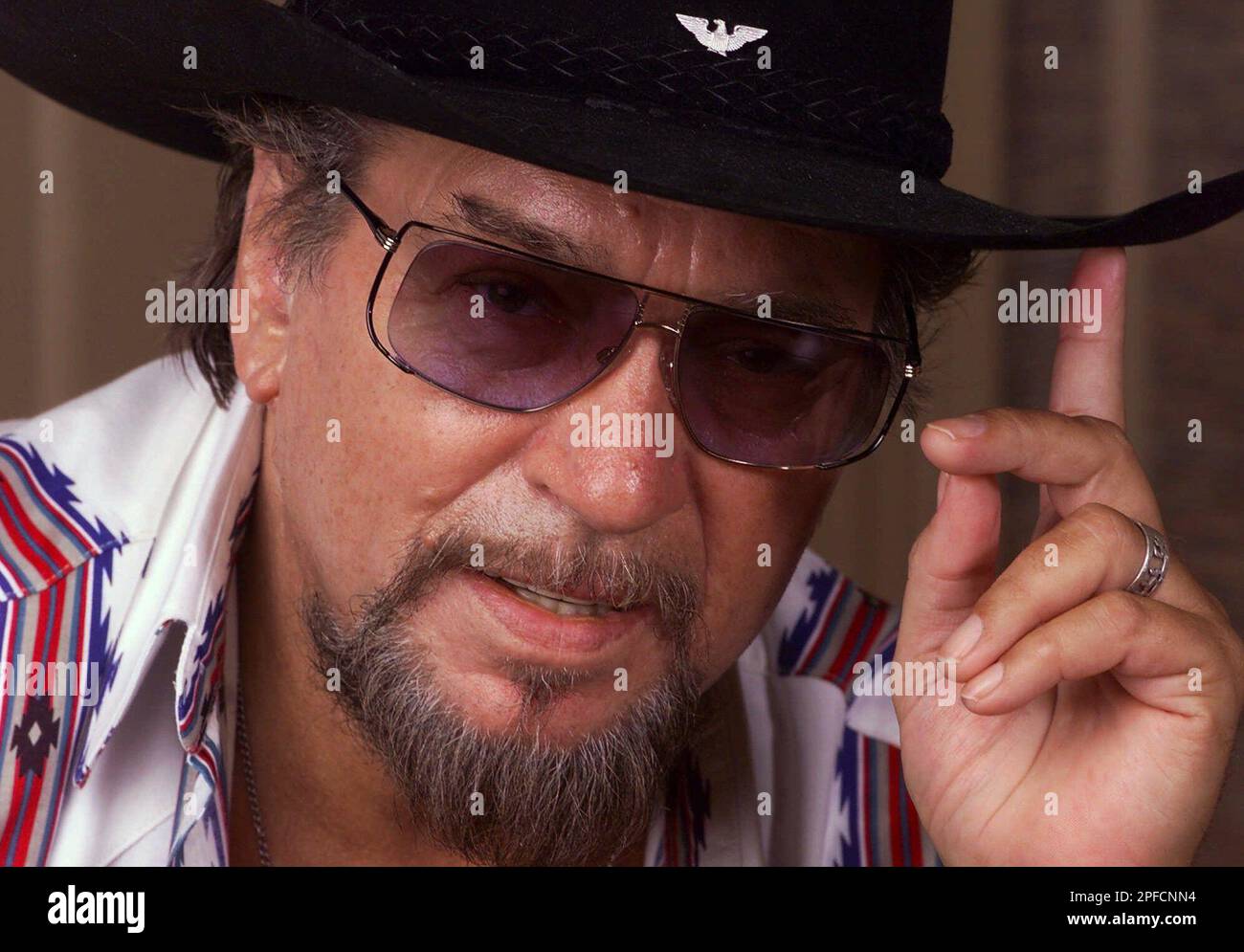 Country music legend Waylon Jennings gestures during an interview in ...