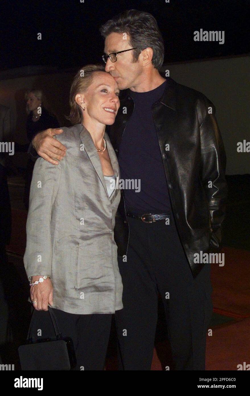 Tim Allen star of "Home Improvement" hug his wife Laura following ...