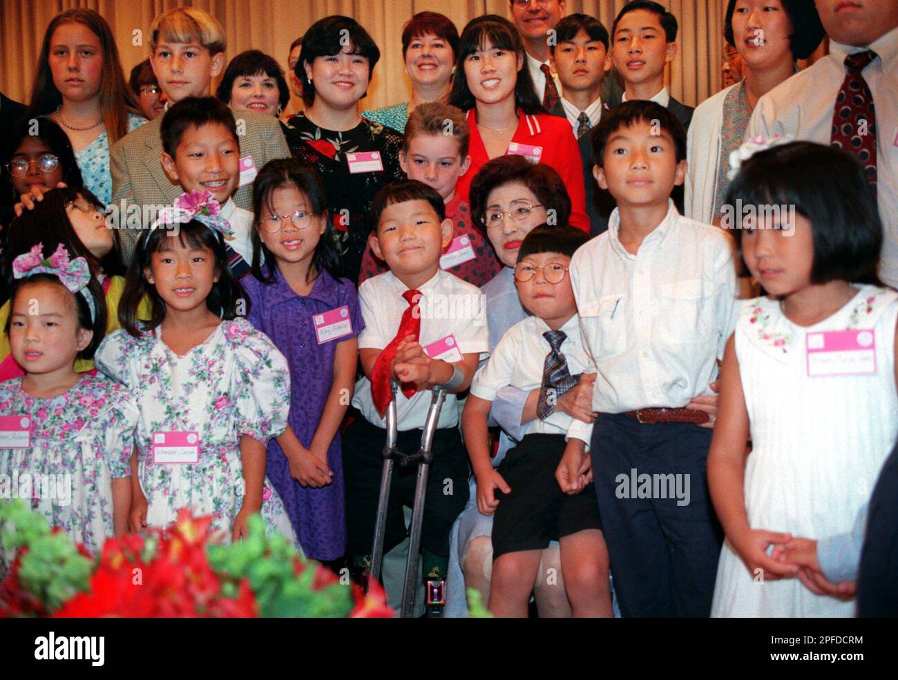 South Korean first lady Lee Hee-ho, center with glasses, poses with a ...