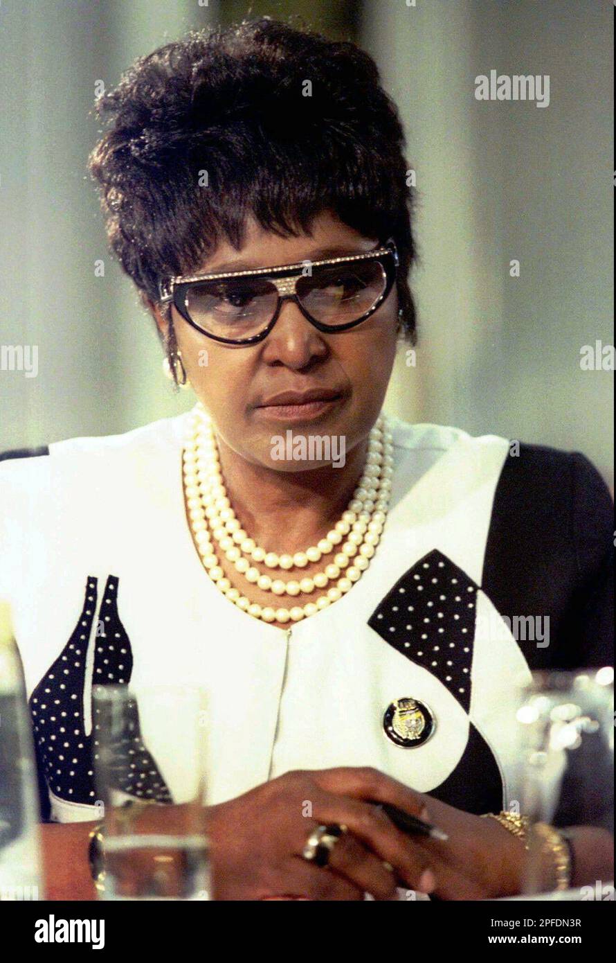 Winnie Madikizela-Mandela listens to the testimony of one of the ...