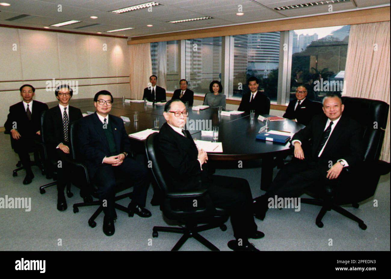 Hong Kong's future leader Tung Chee-hwa, far right, and members of his ...