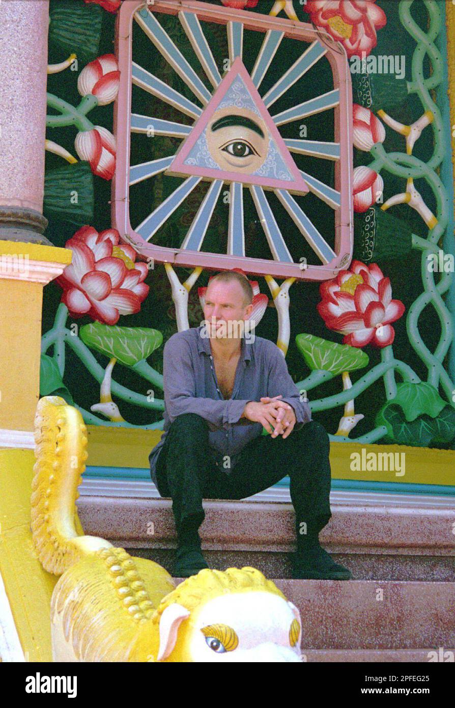 Rock star Sting sits beneath the "Divine Eye" during a visit to the Cao ...