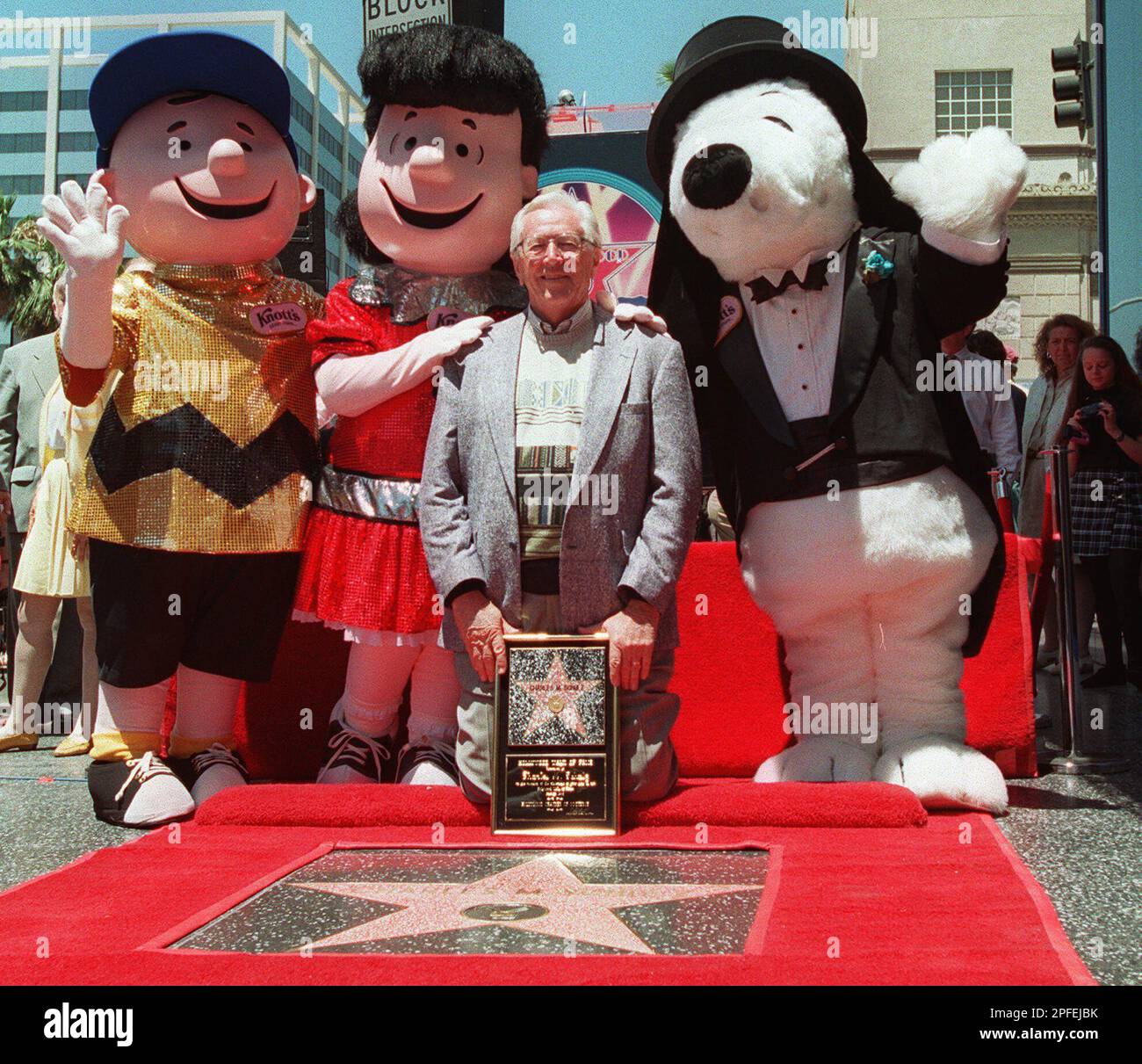 "Peanuts" creator Charles M. Schulz is joined by his characters Charlie ...
