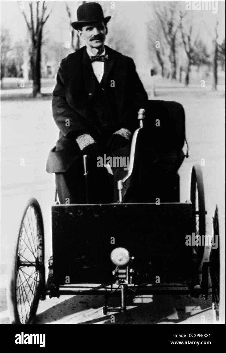 Henry Ford is shown on his first vehicle, the Quadricycle, in a 1896 ...
