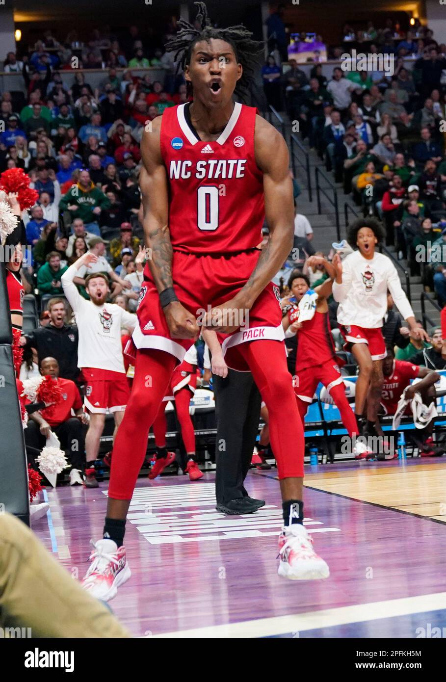 North Carolina State guard Terquavion Smith reacts after dunking ...