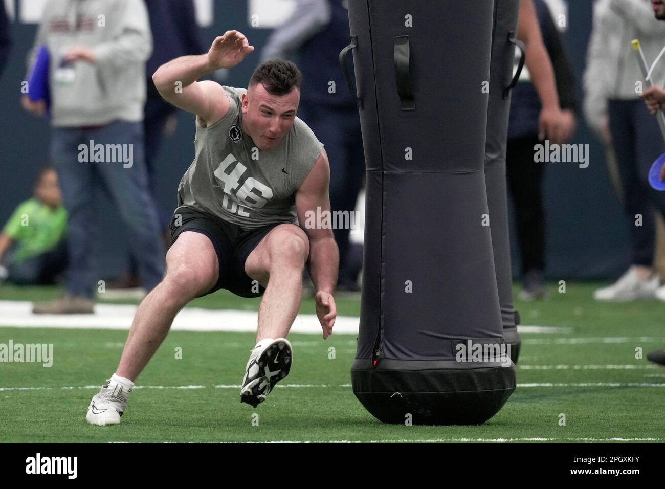 Defensive lineman Nick Tarburton runs a drill during Penn State's ...