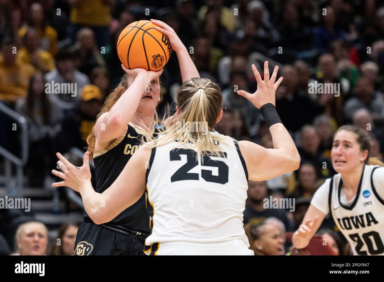 Colorado guard Frida Formann, left, shoots over Iowa forward Monika ...