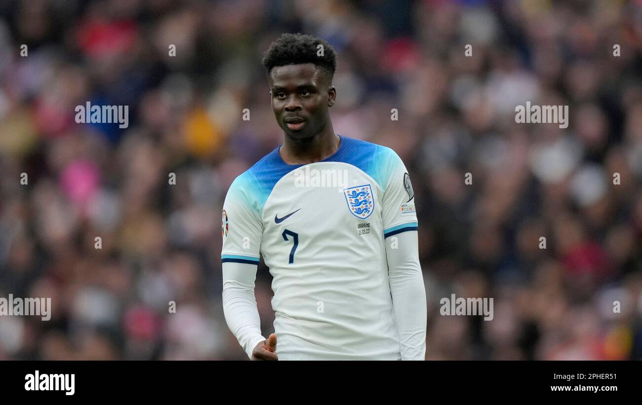 England's Bukayo Saka gestures to a teammate during the Euro 2024 group ...