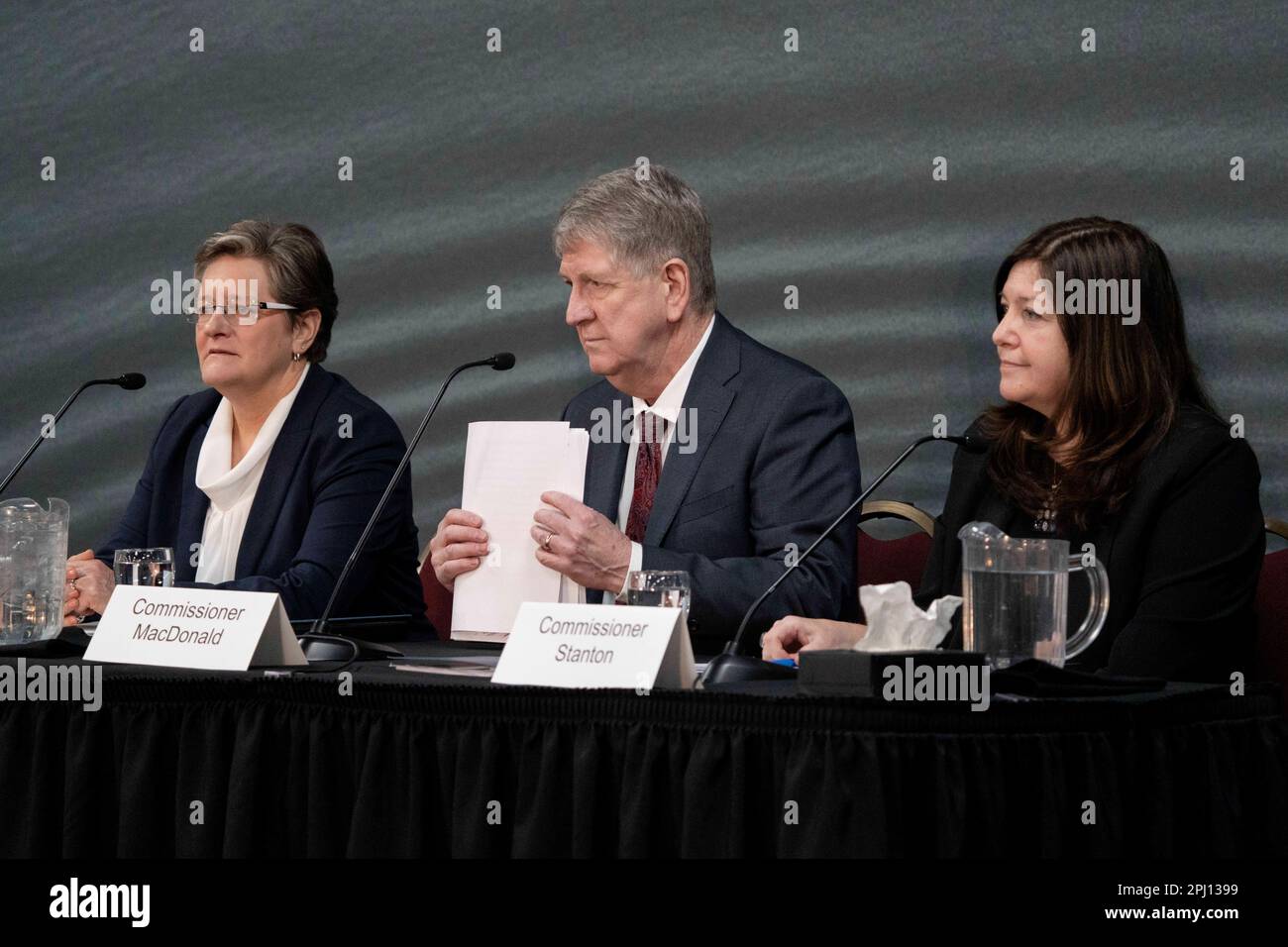 Commissioners, from left, Leanne Fitch, Michael MacDonald, chair, and ...