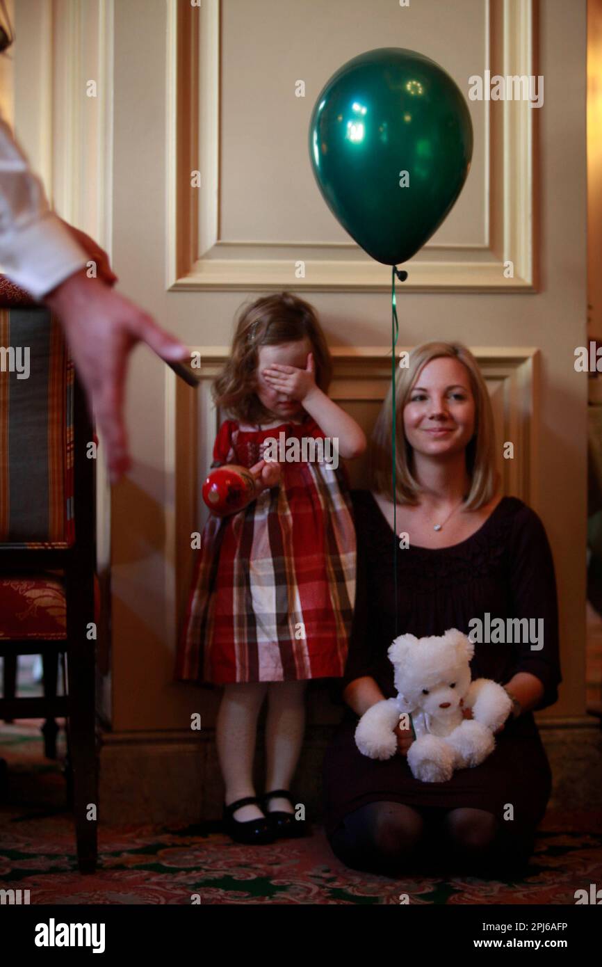 Sadie Tripaldi, 2, of Danville, standing next to her mother Jill ...