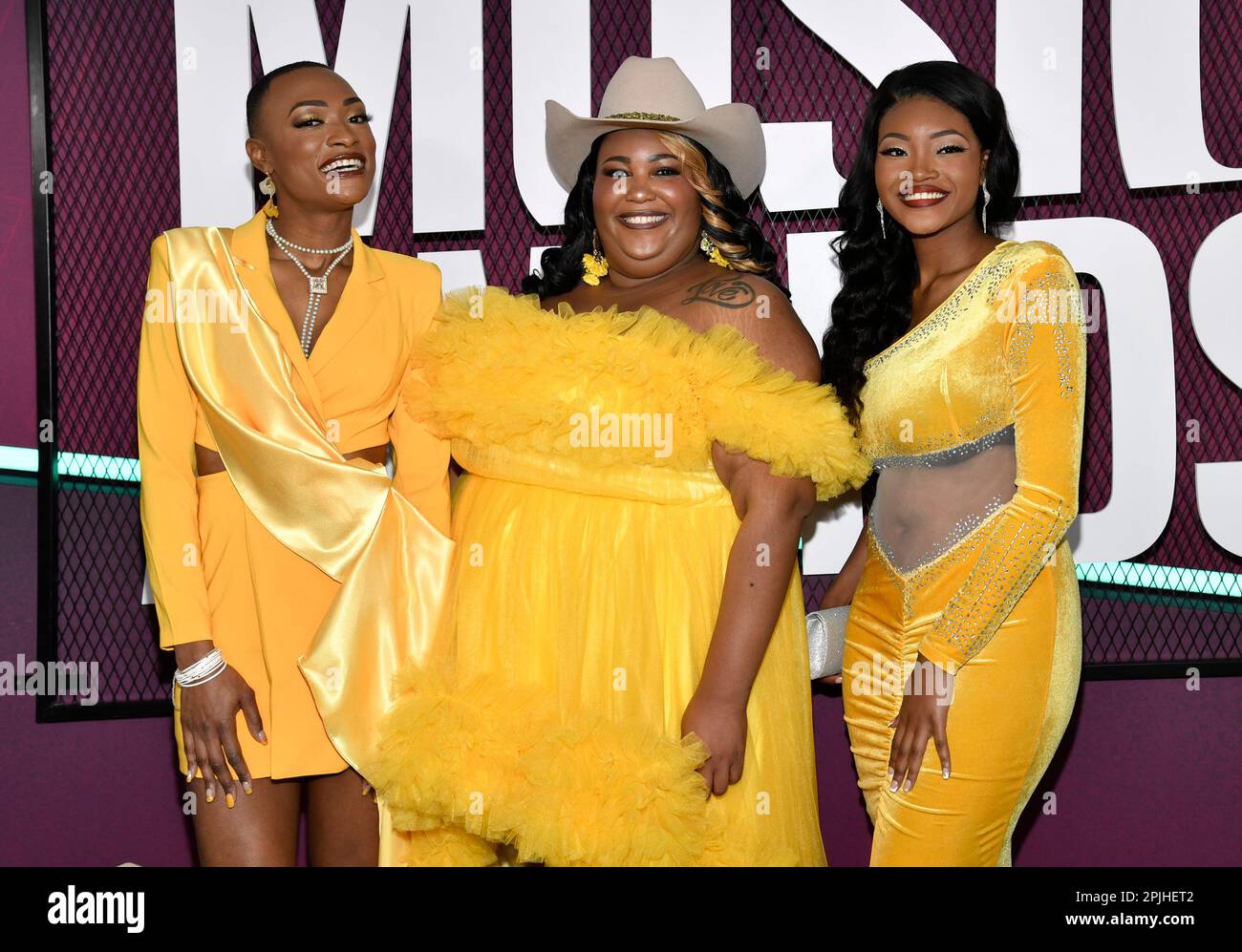 Trea Swindle, from left, Danica Hart and Devynn Hart of Chapel Hart arrive at the CMT Music ...