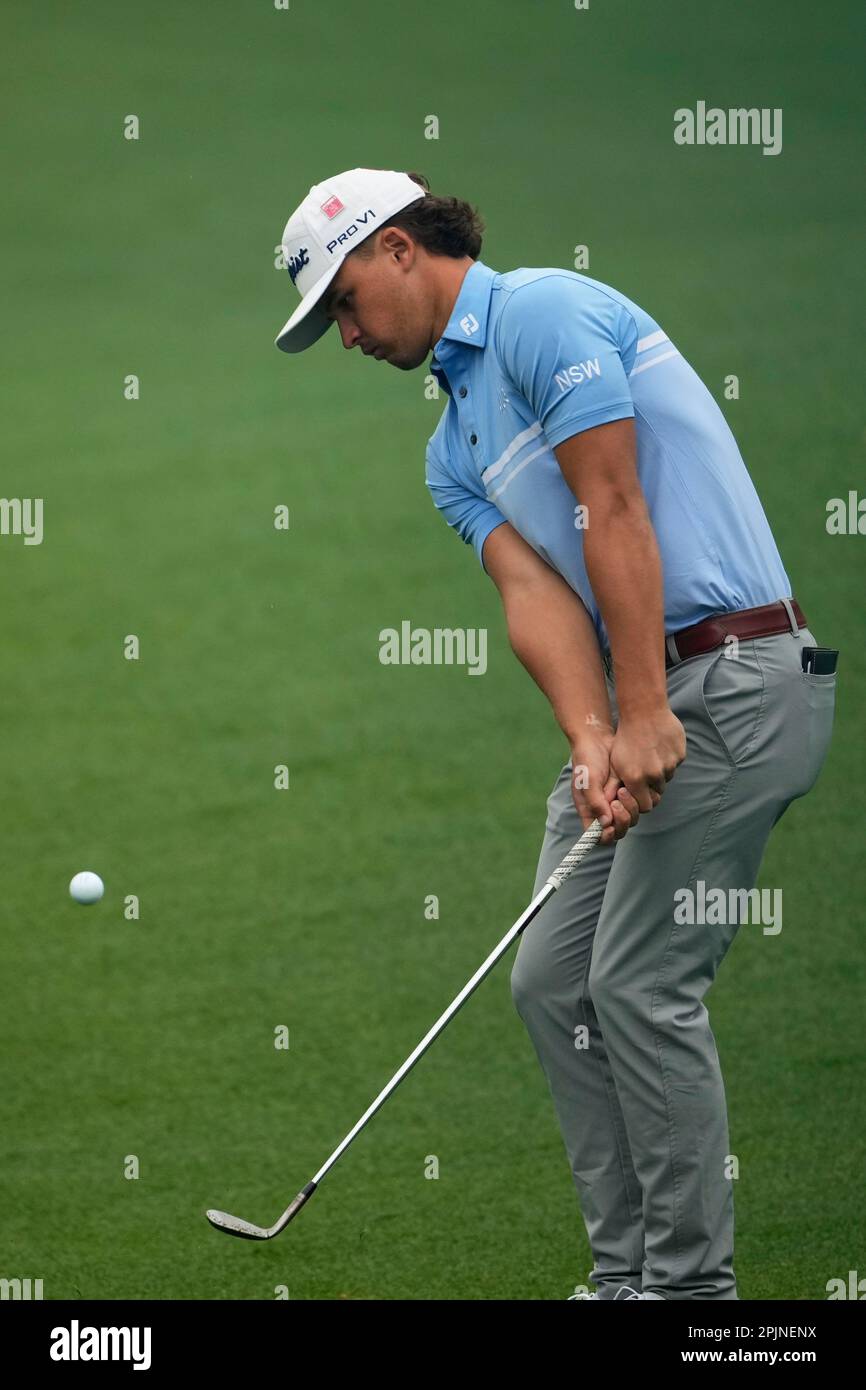 Harrison Crowe, of Australia, hits out of the 14th fairway during a ...